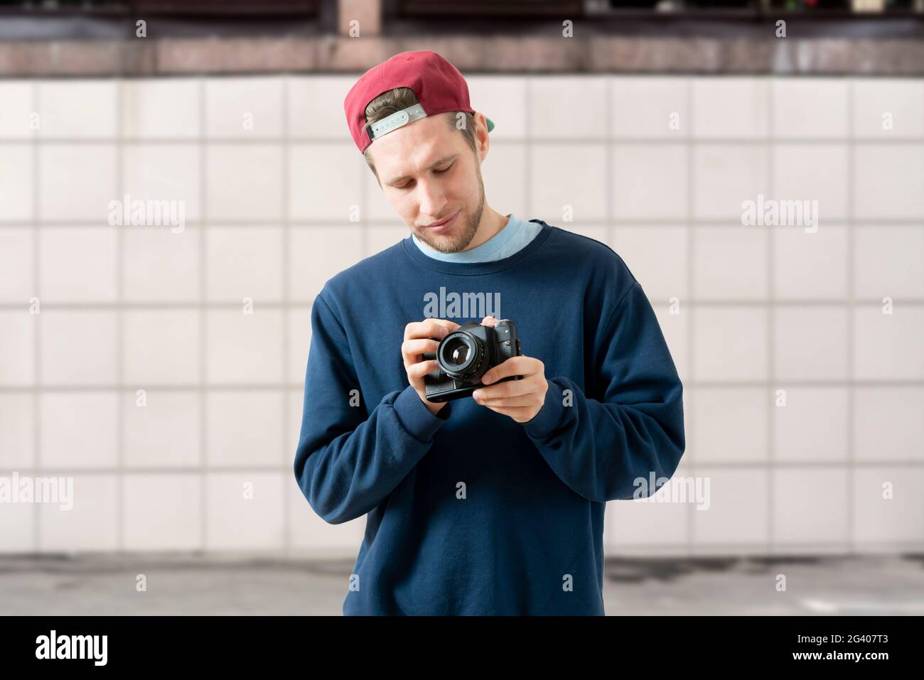 happy person holding a vintage old camera and making photos Stock Photo ...