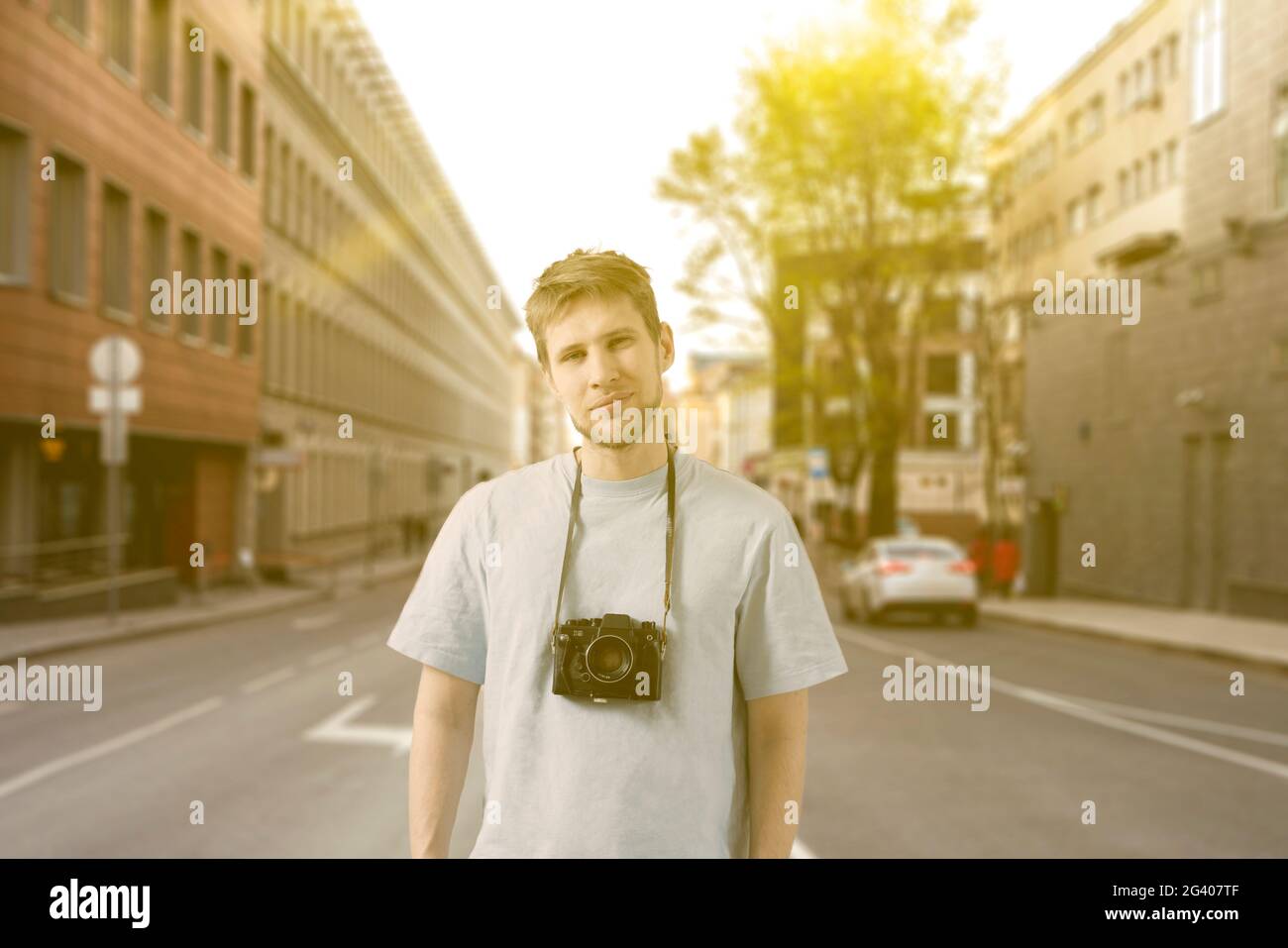 happy person holding a vintage old camera and making photos Stock Photo ...