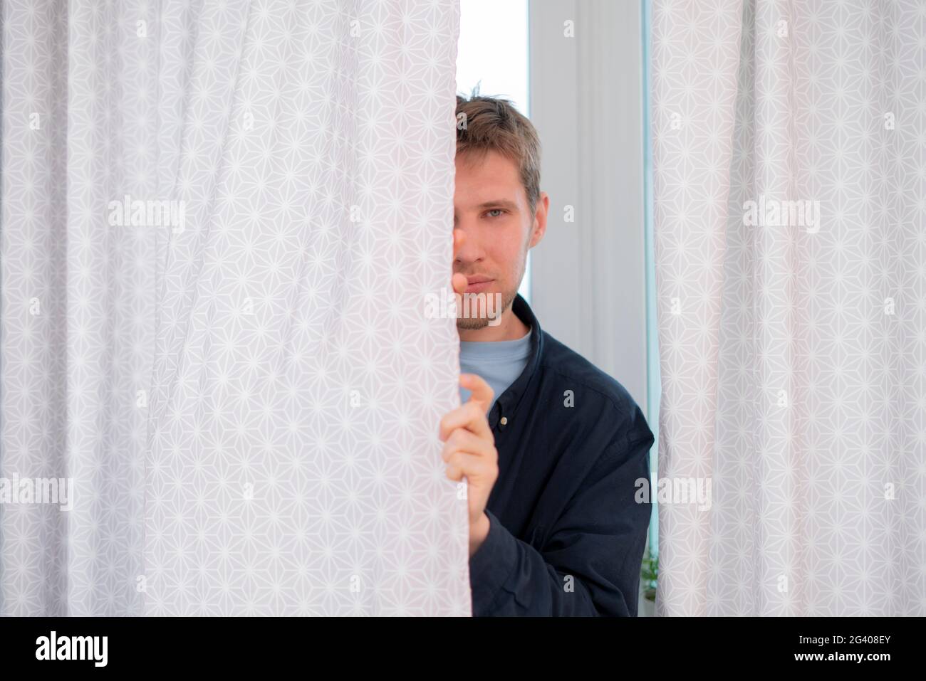 person with half covered face oversee peek and spy, the lookout Stock ...