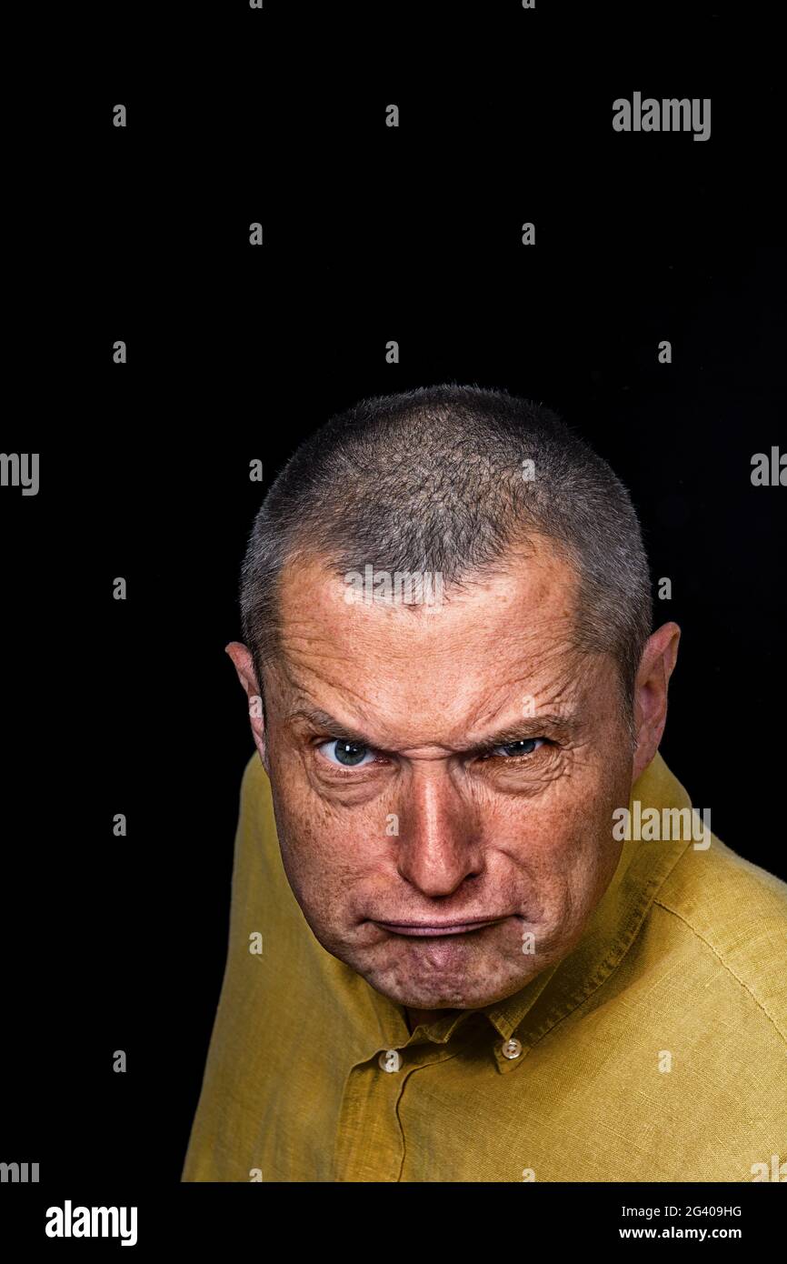 Male Portrait with grotesque emotions Stock Photo - Alamy
