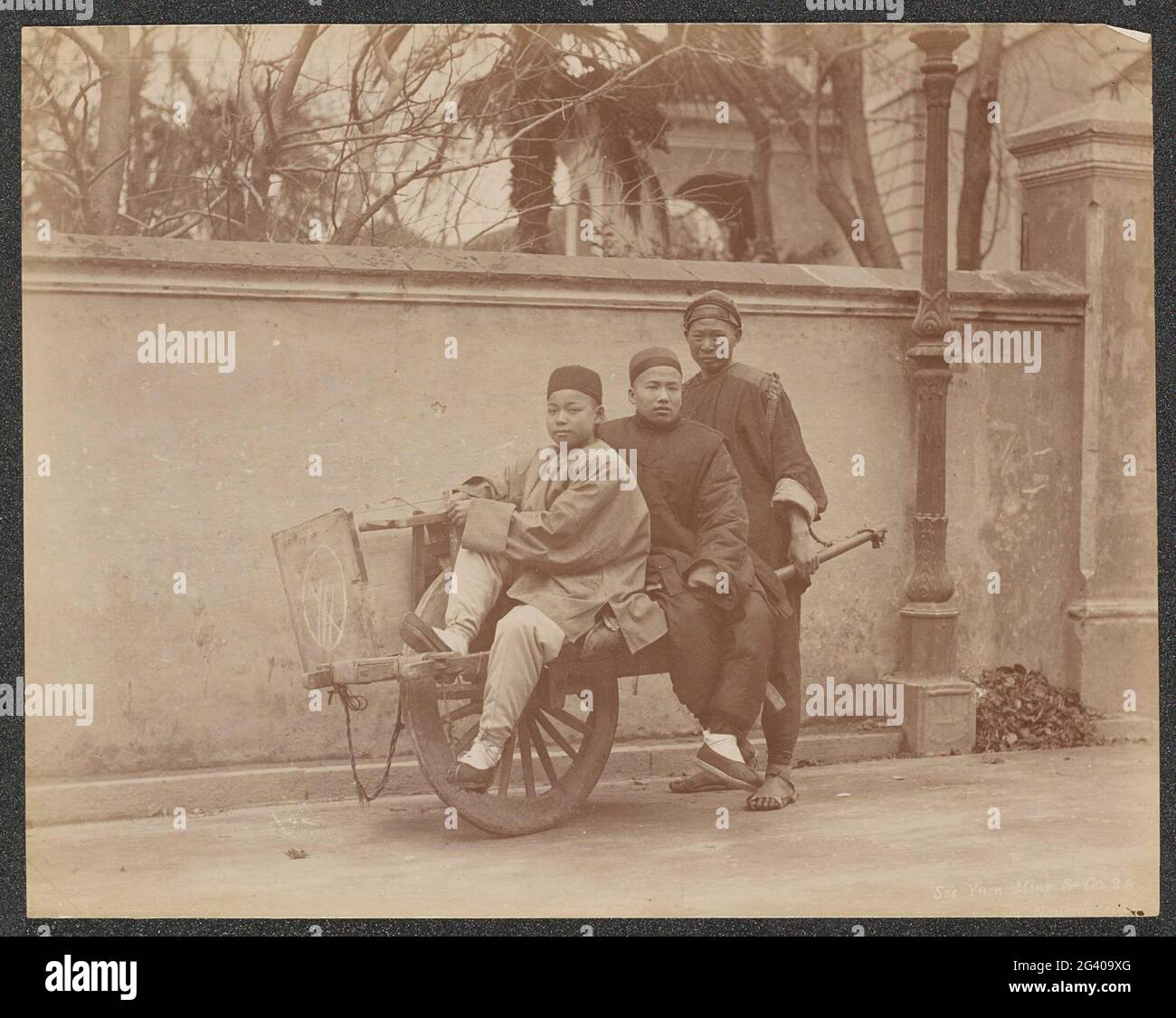Three Chinese in Shanghai use wheelbarrow as a means of transport. Part ...