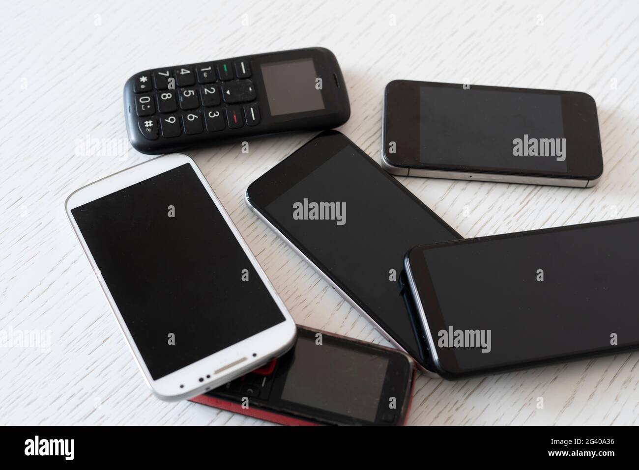 technology evolution concept, some old vintage phone cell phones and ...