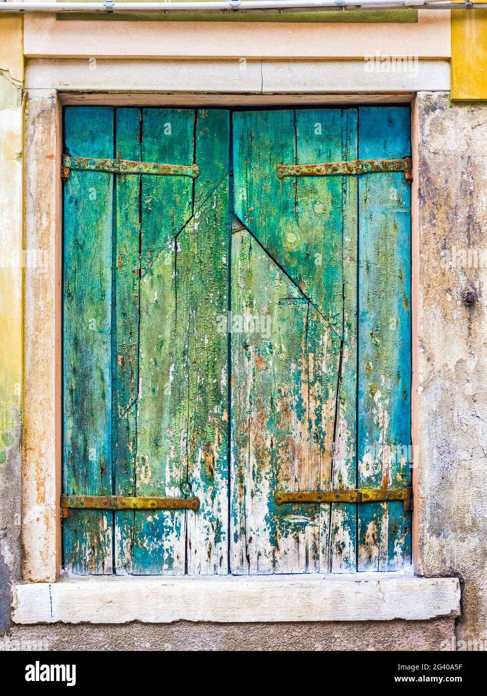 Beautiful vintage shutters on the windows of the old house Stock Photo ...