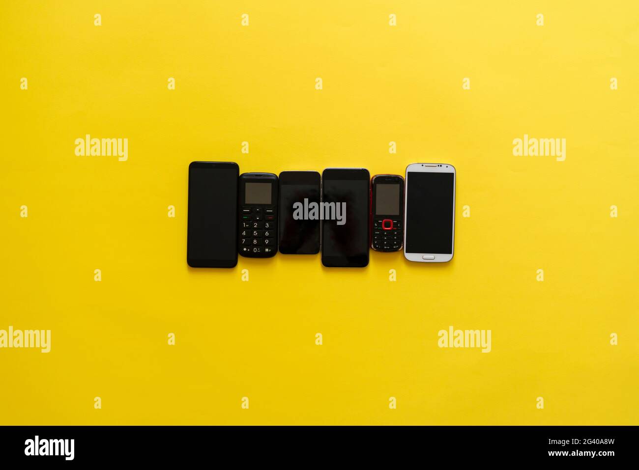 technology evolution concept, some old vintage phone cell phones and ...