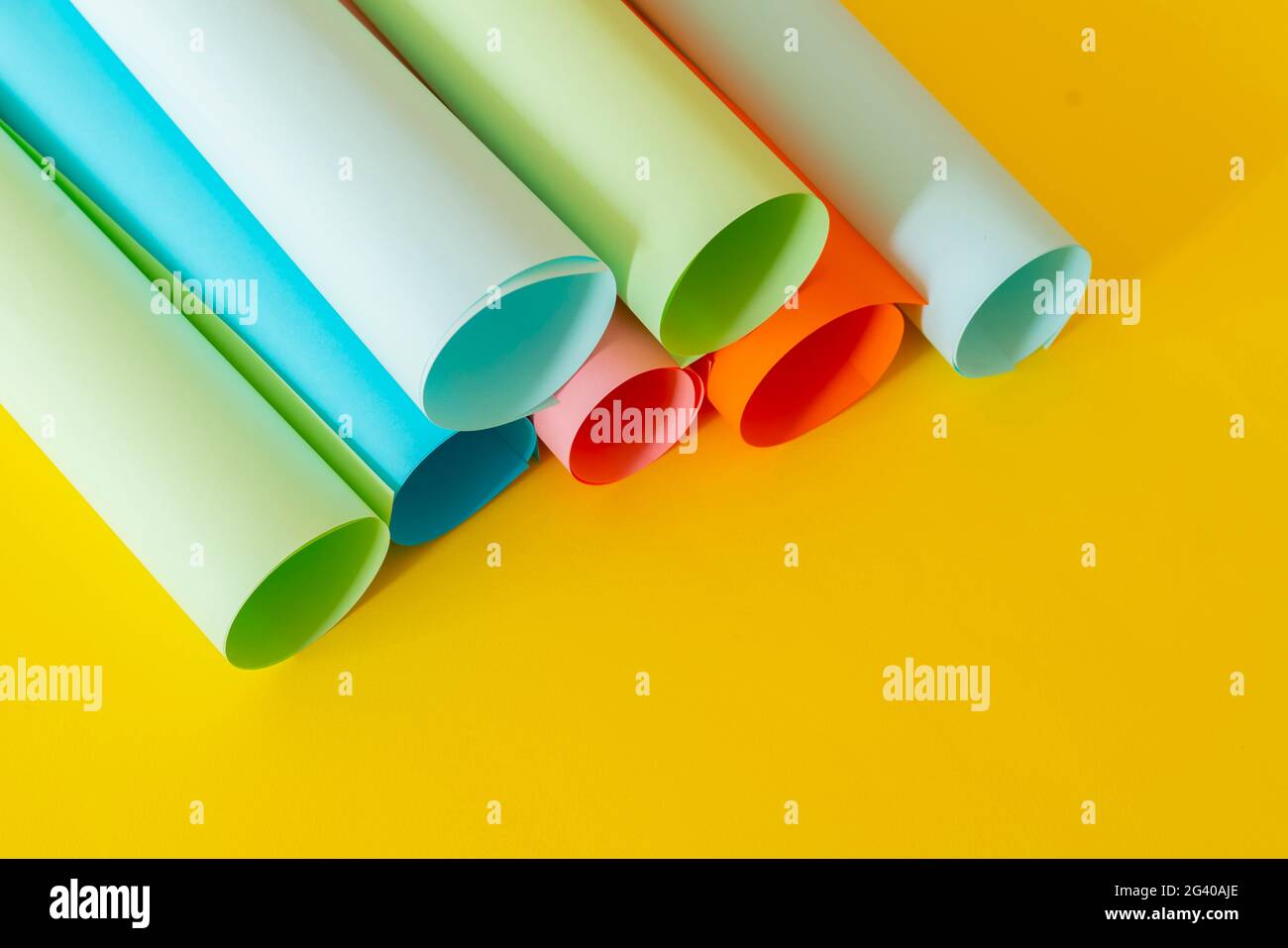 some rolls of abstract pastel colors, close up creative sheets design ...