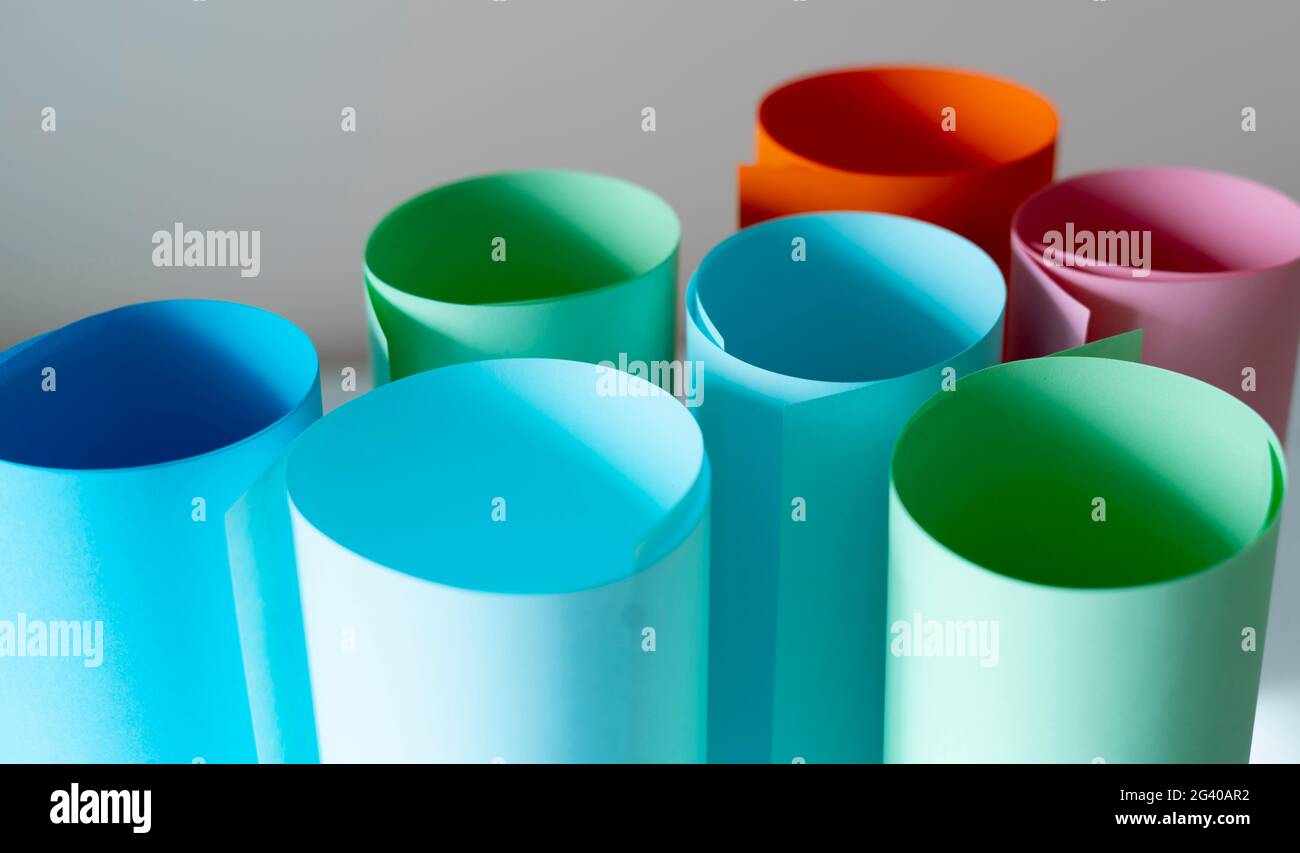 some rolls of abstract pastel colors, close up creative sheets design ...