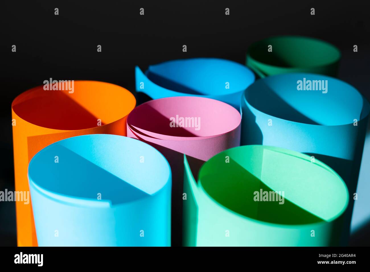 some rolls of abstract pastel colors, close up creative sheets design ...