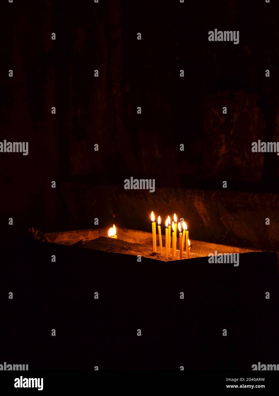 Candles burning in a church Stock Photo - Alamy
