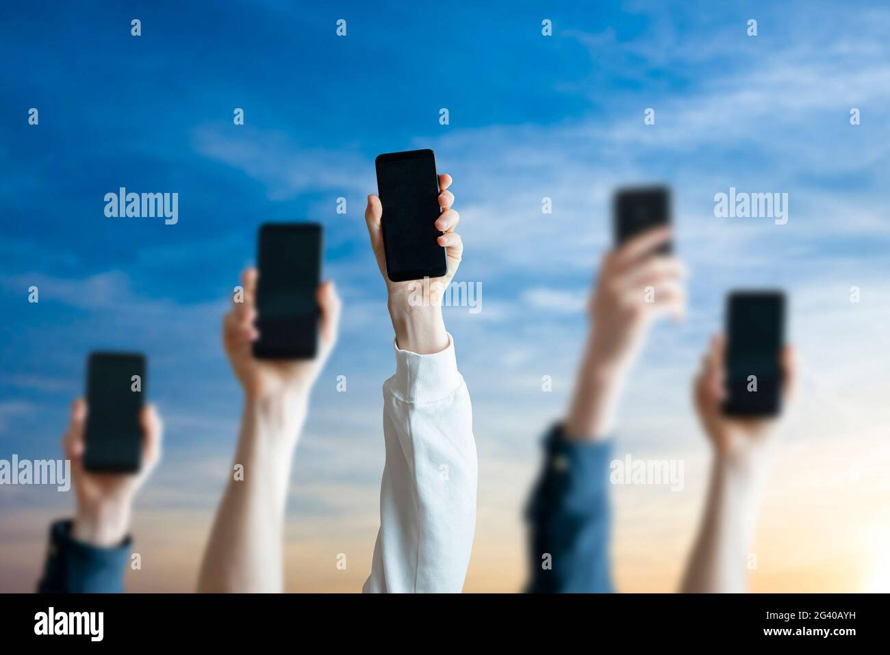 large group of people hold digital phones device, many human hands ...