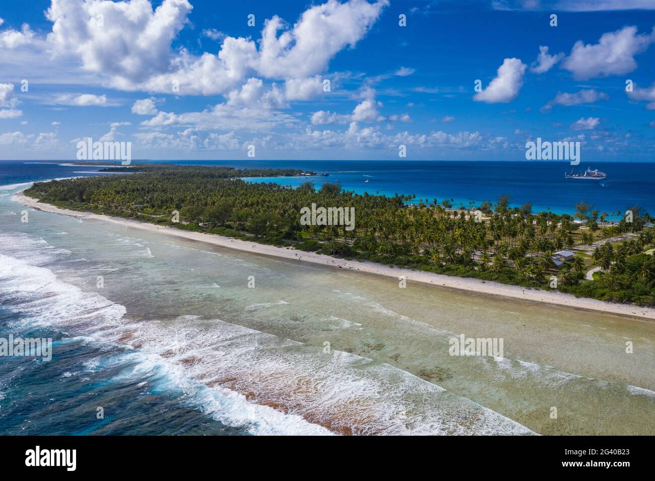 Aerial view of Avatoru Island and passenger freighter Aranui 5 (Aranui ...