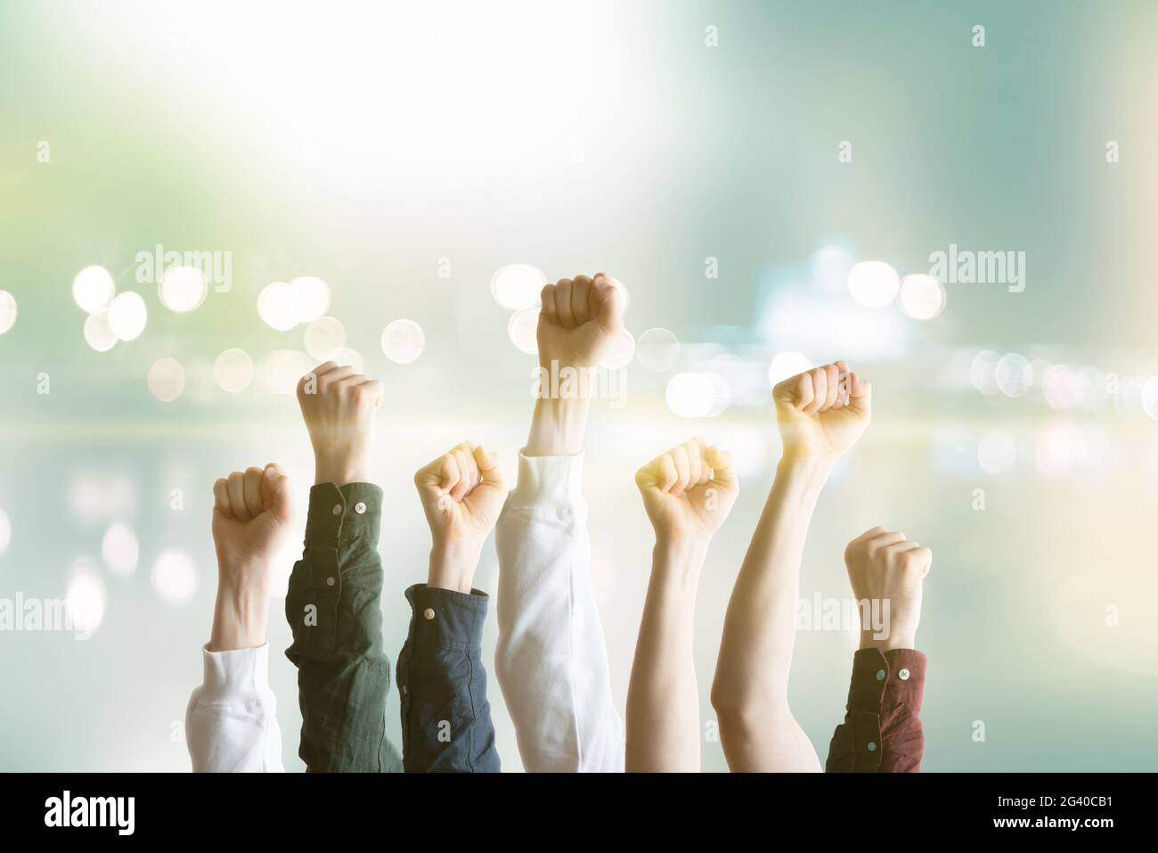 people with raised hands fists in the air, as symbol of protest for ...
