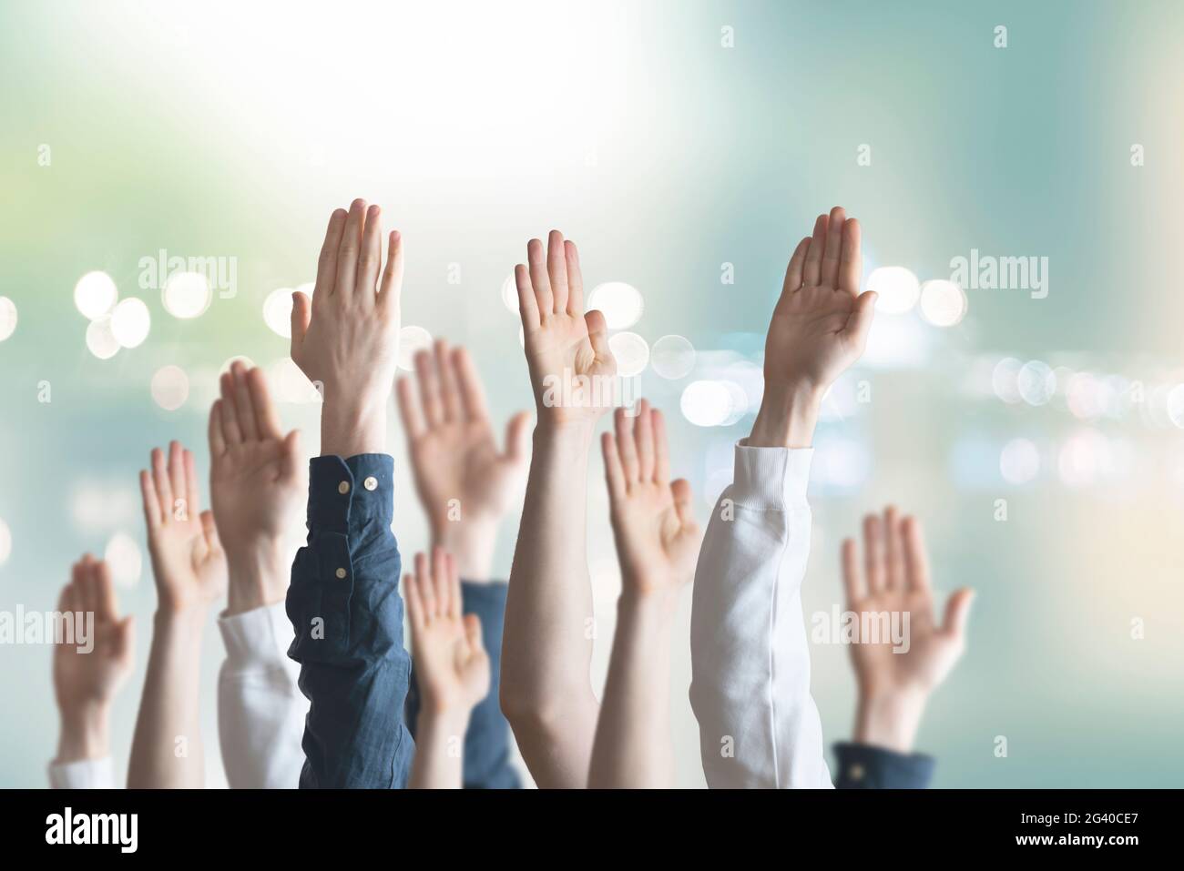 people hands raised in the air, vote, election, democracy Stock Photo ...