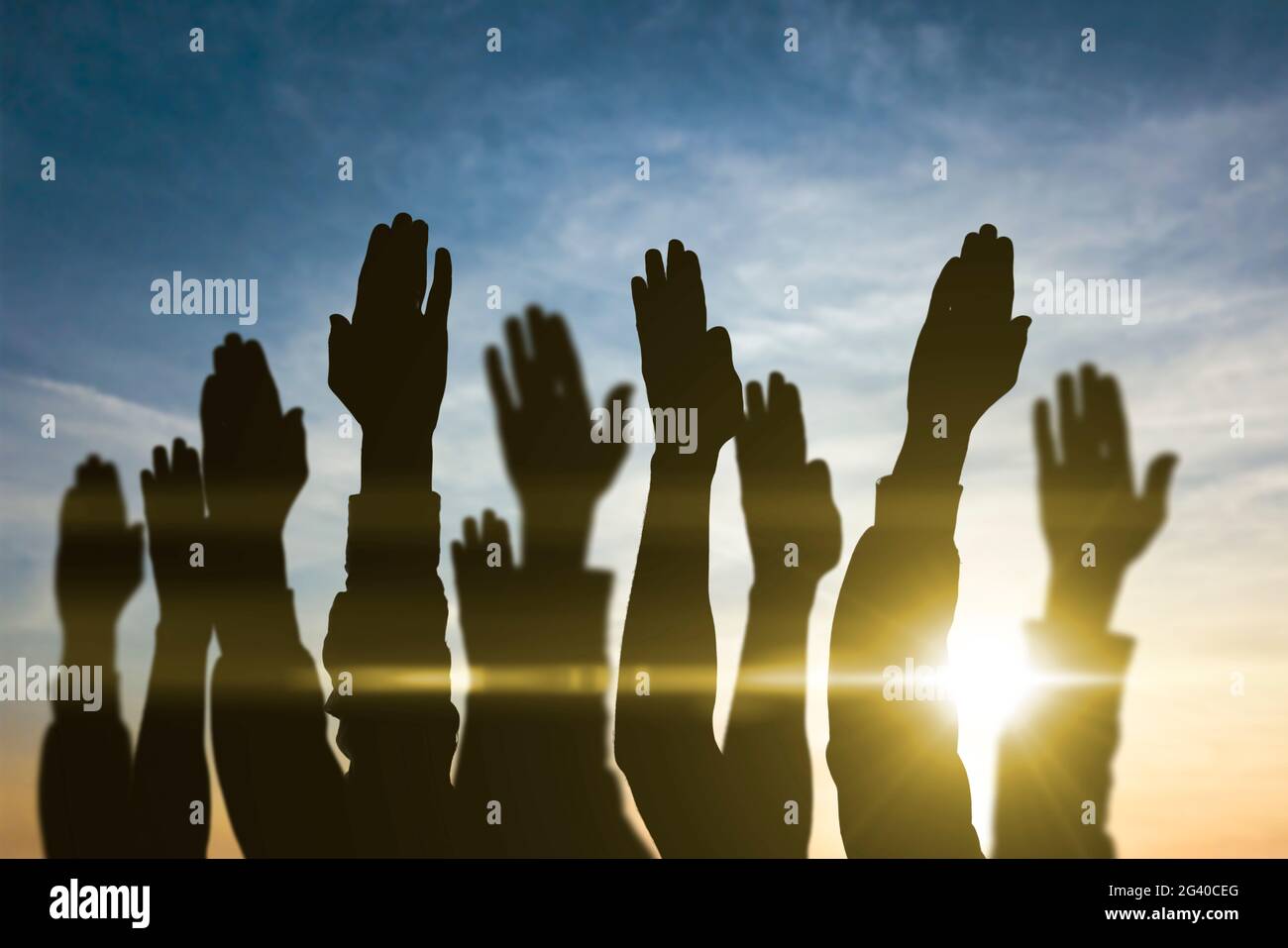 people hands raised in the air, vote, election, democracy Stock Photo ...