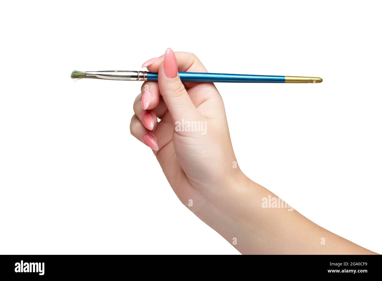 Art brush in female hand isolated on white background Stock Photo - Alamy