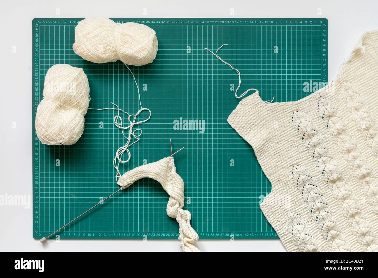 flat lay knitting supplies equipment, handmade wool clothes Stock Photo ...