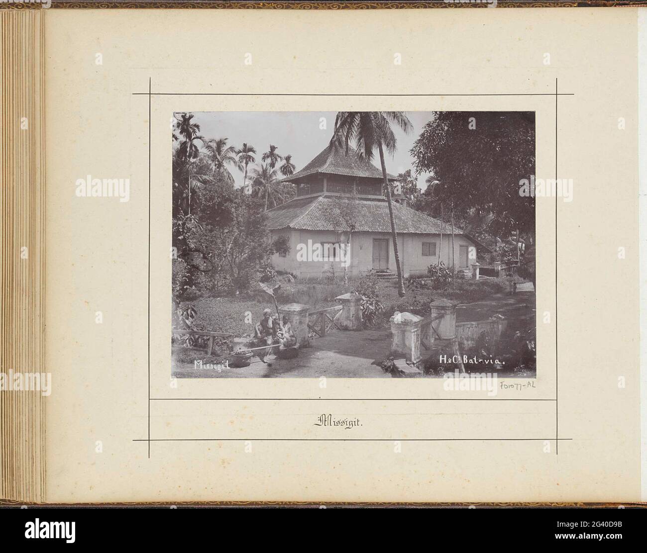 Mosque in Batavia with an Indian man with two children in the ...