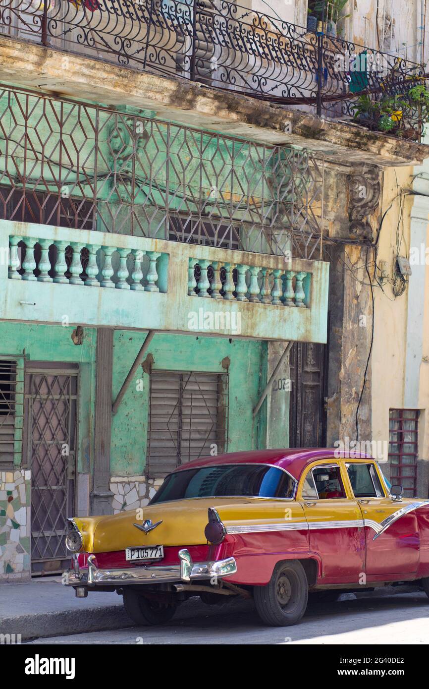 Red and yellow classic car in Havana, Cuba Stock Photo - Alamy