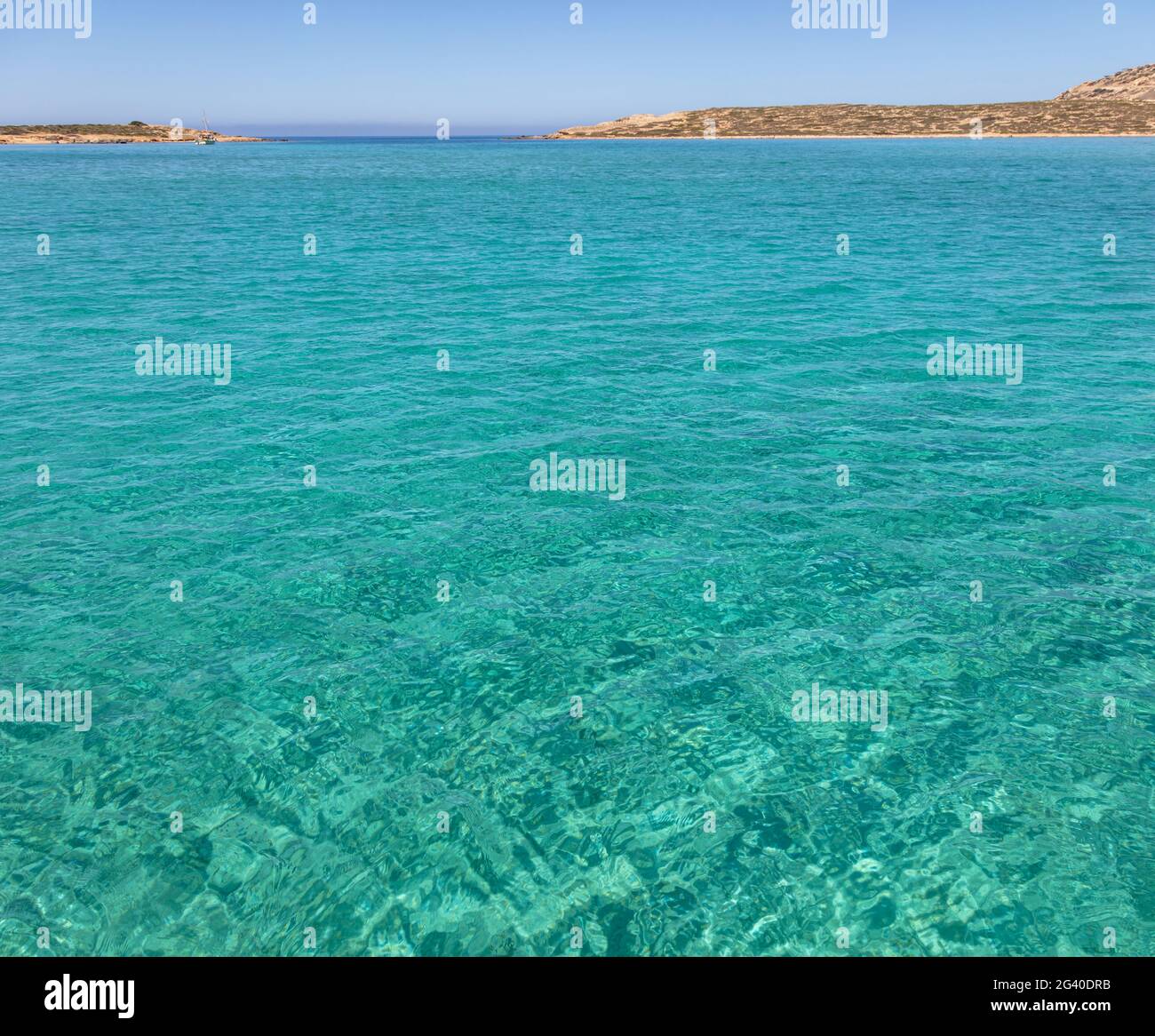 Cyclades islands, Rinia bay clear transparent water, Greece. Turquoise ...