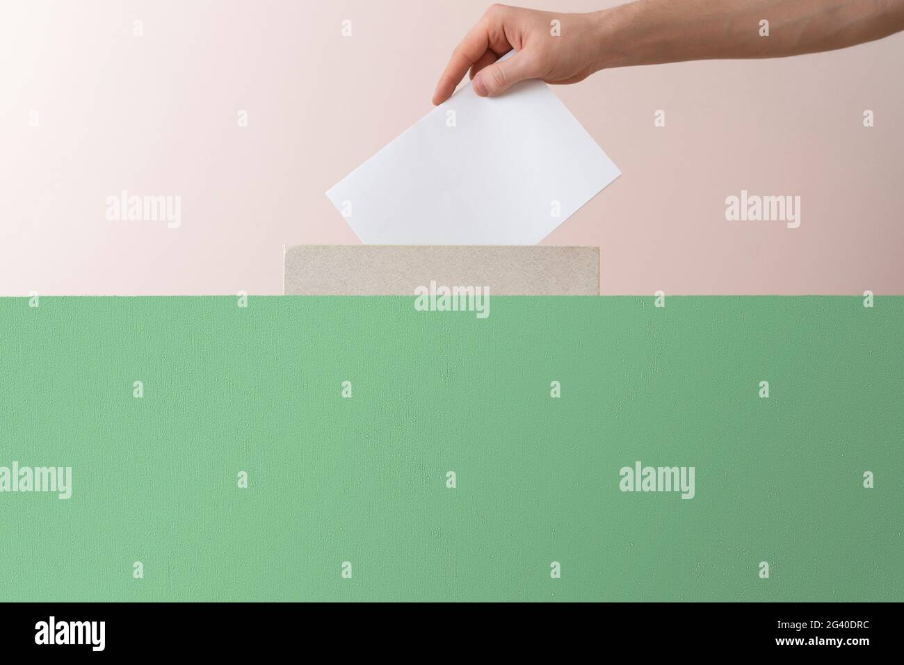 voter hand put paper in the urn, democracy election Stock Photo - Alamy