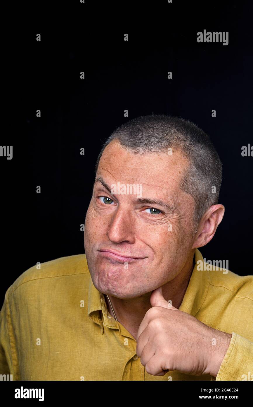 Male Portrait with grotesque emotions Stock Photo - Alamy