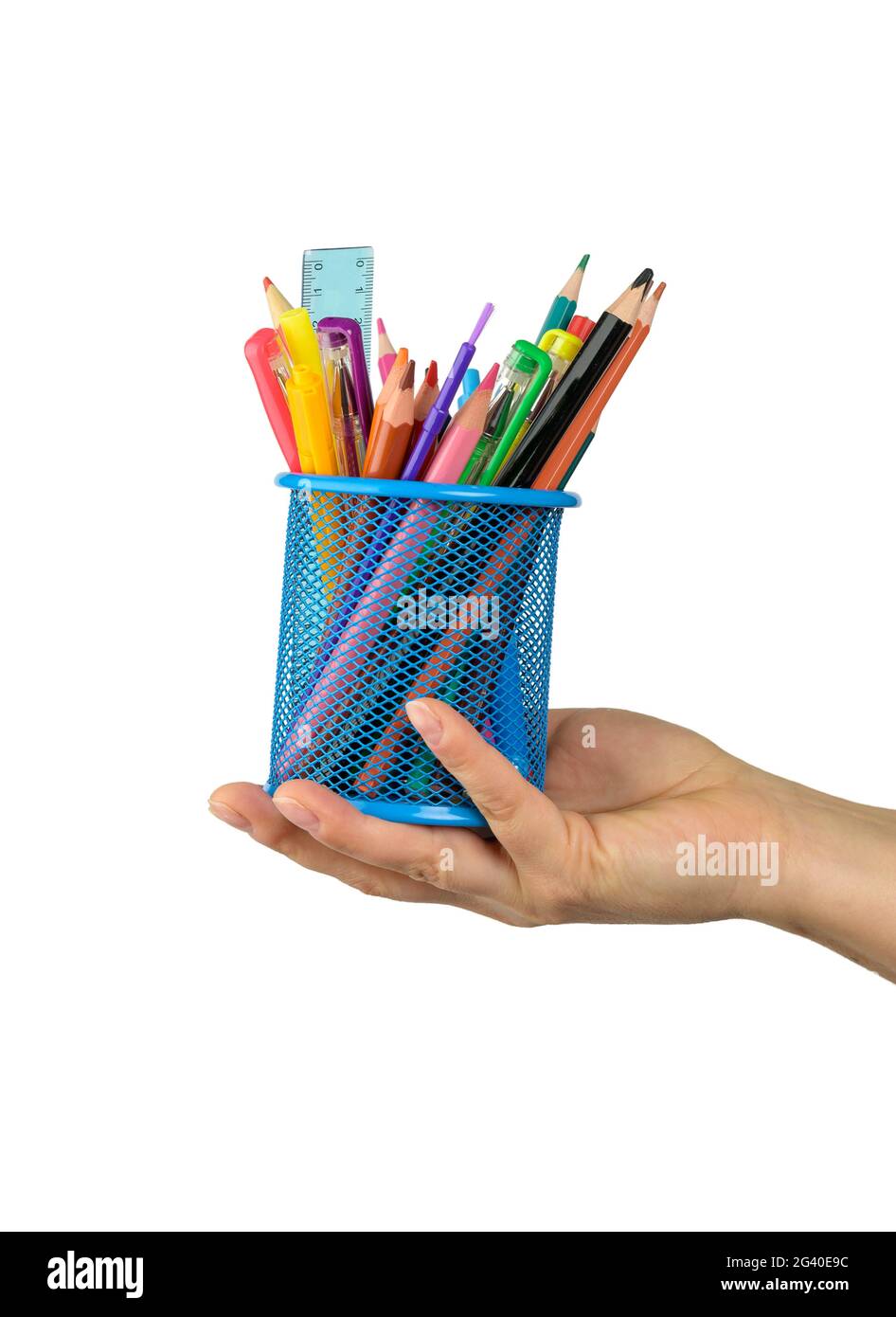 Female hand holding metal stand with stationery on white background ...