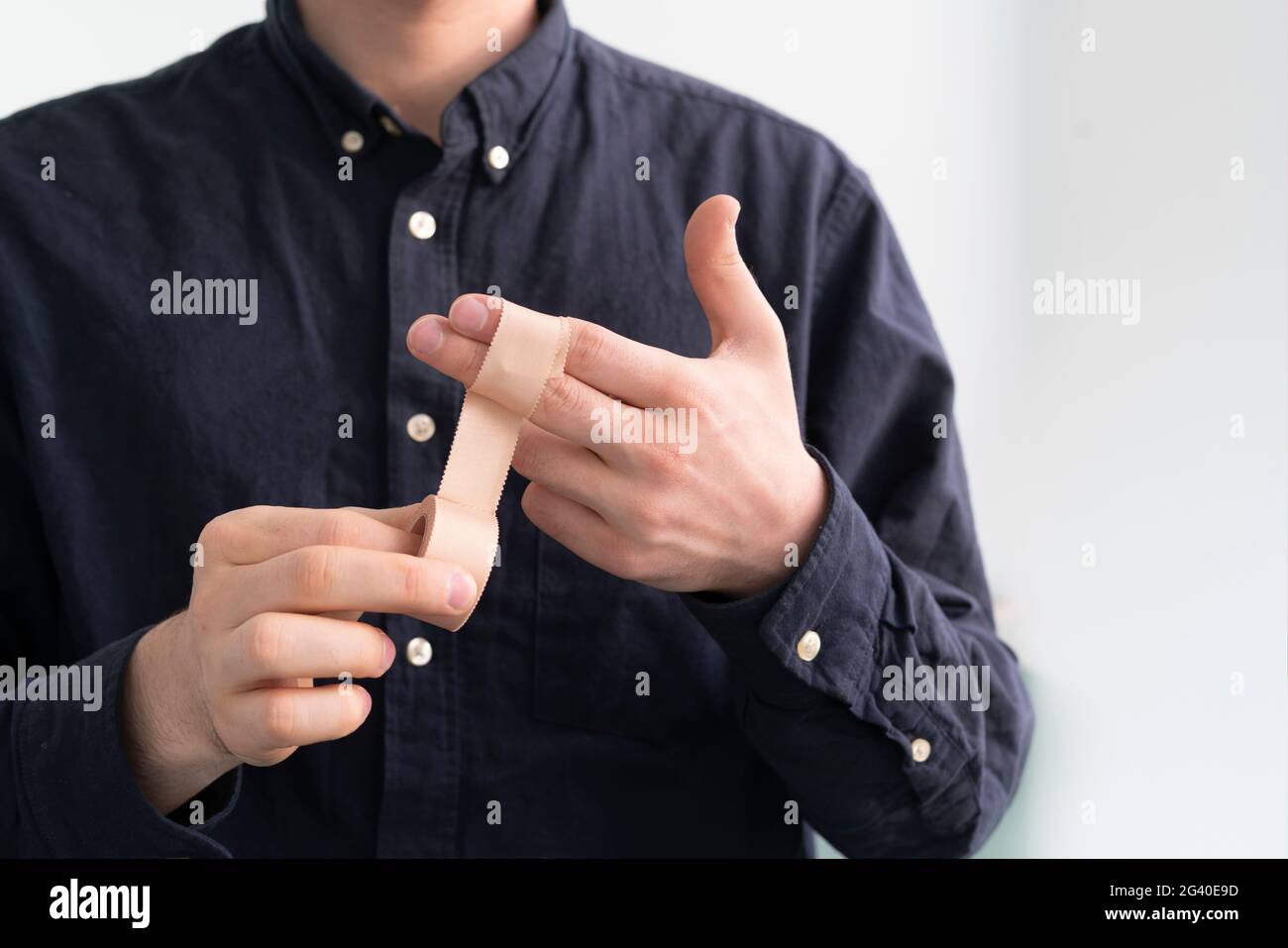 applying medical tape to the hand, skin pain protection plaster Stock ...