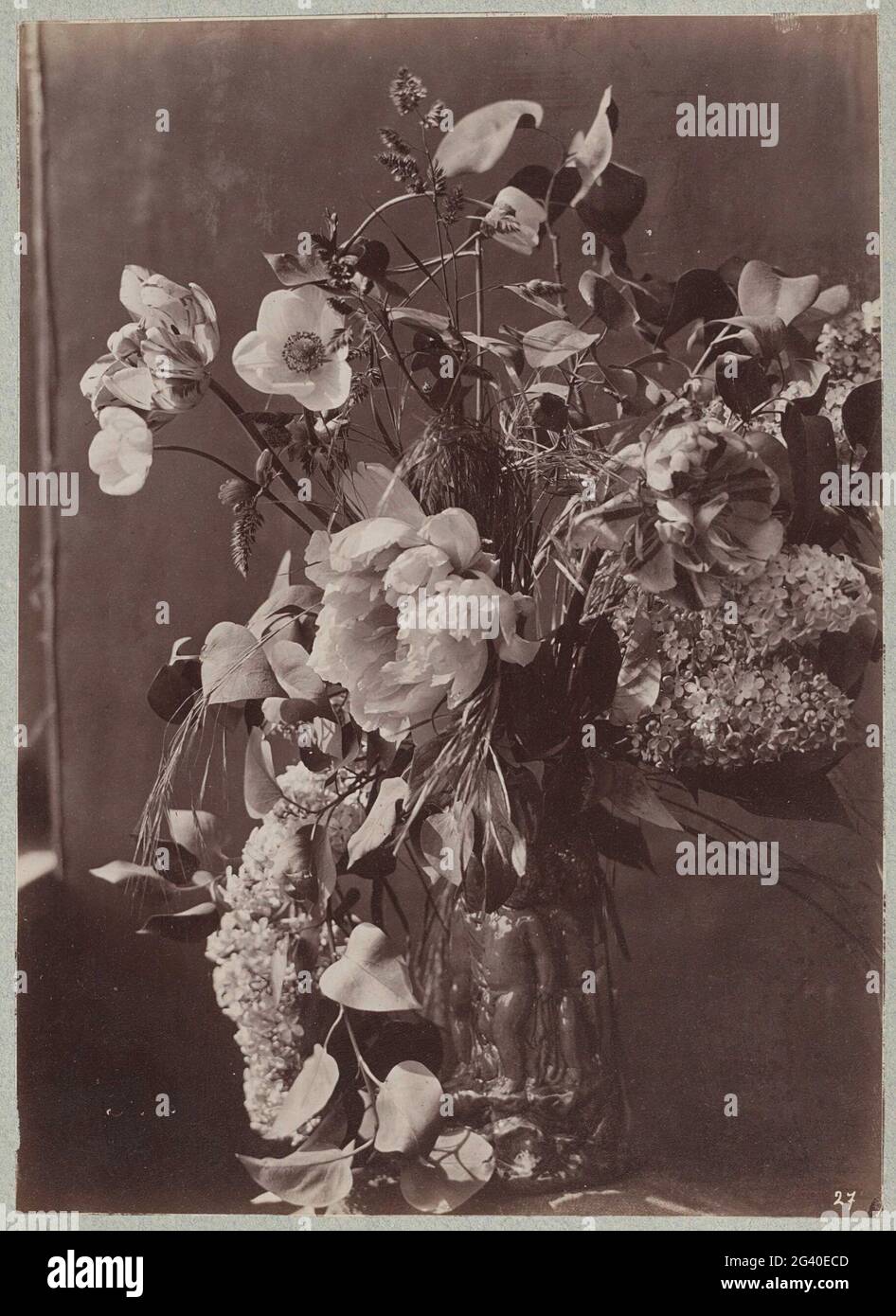 Flower study with ornamented vase. Part of collective tape with photos ...