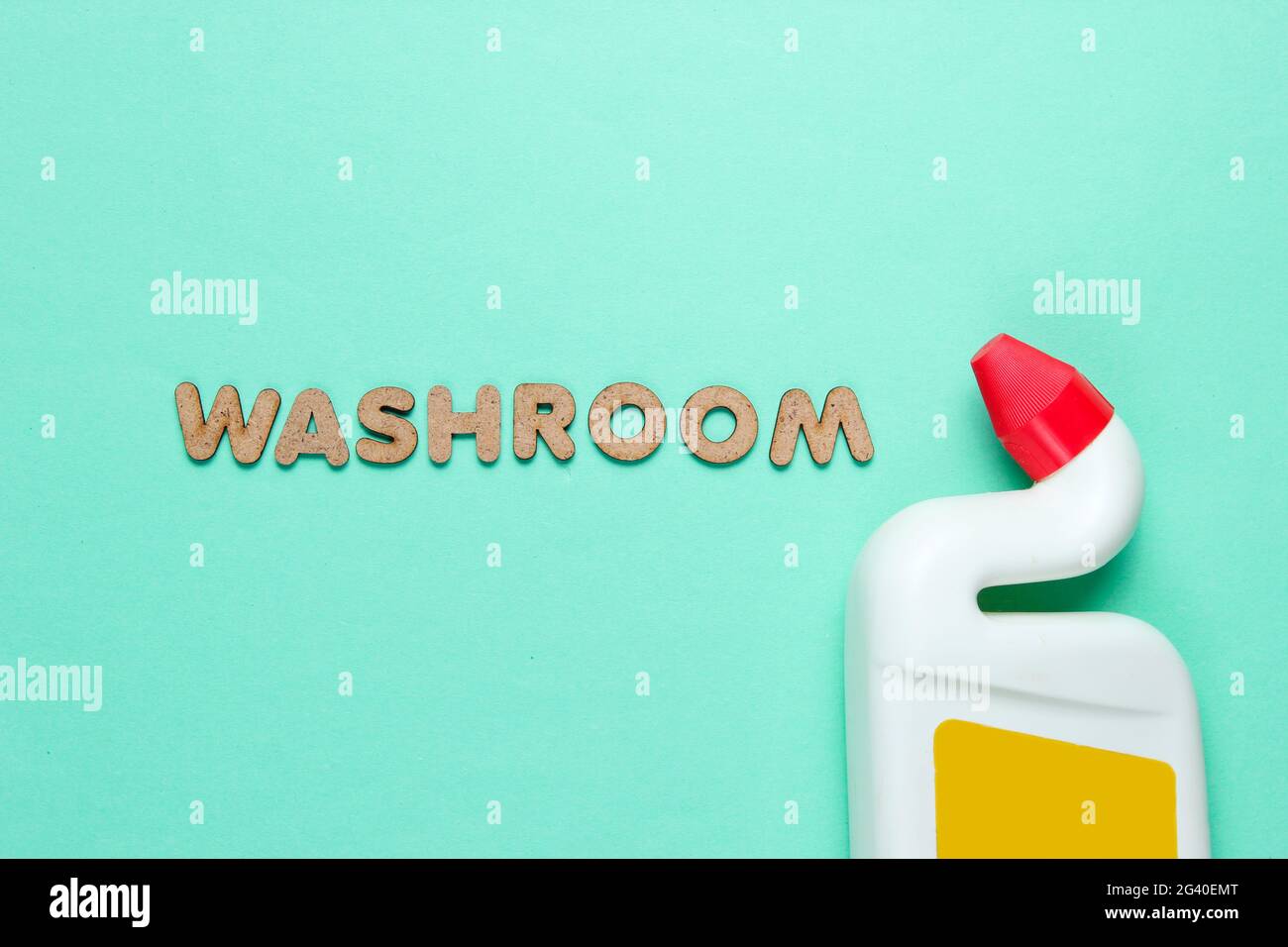 Bottle toilet wash gel on a blue background with the word washroom. Top ...