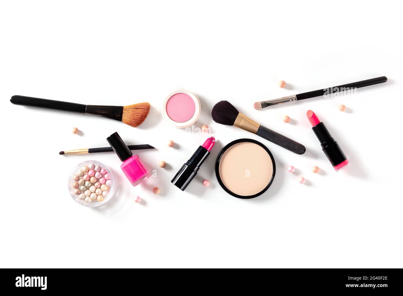 Makeup tools, shot from the top on a white background with a place for ...