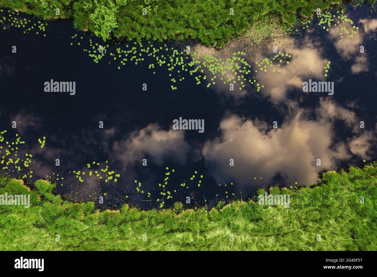Aerial view of the lakes with reflection of blue sky and clouds in the ...