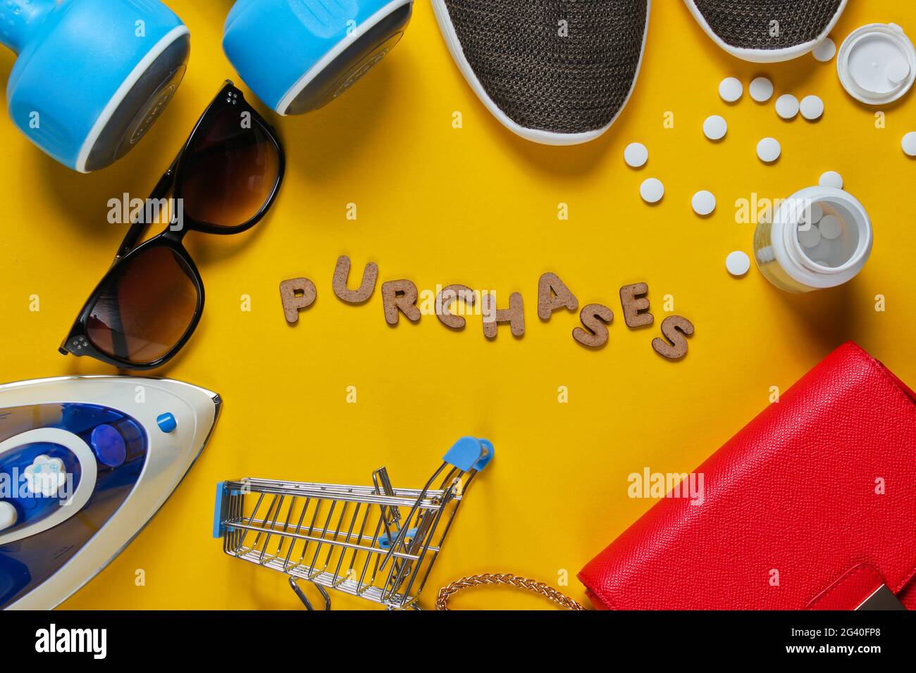 Purchases concept. Many different objects on a yellow background. Top ...