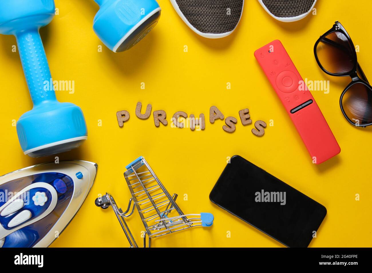 Purchases concept. Many different objects on a yellow background. Top ...