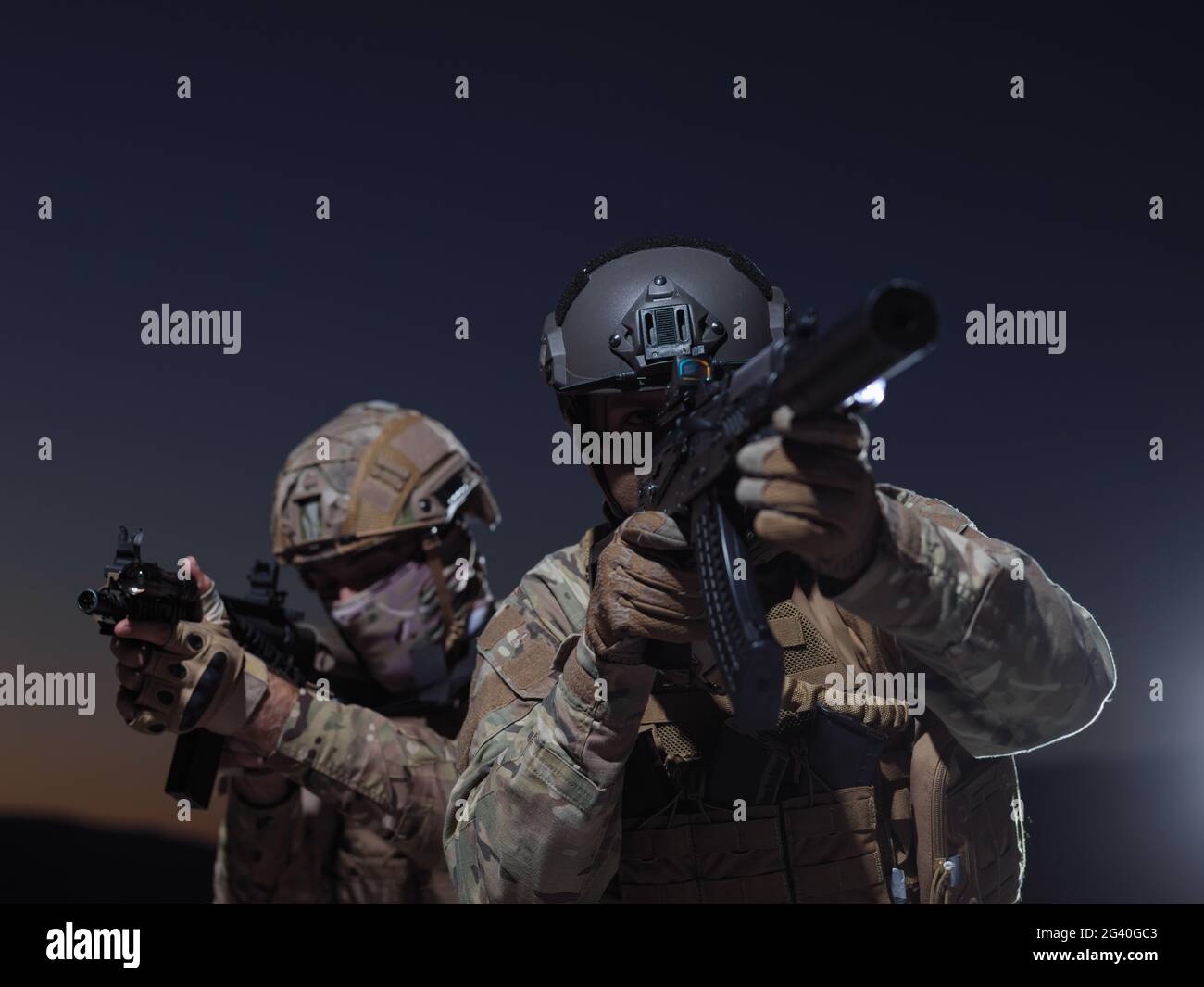 Soldiers squad in night mission Stock Photo - Alamy