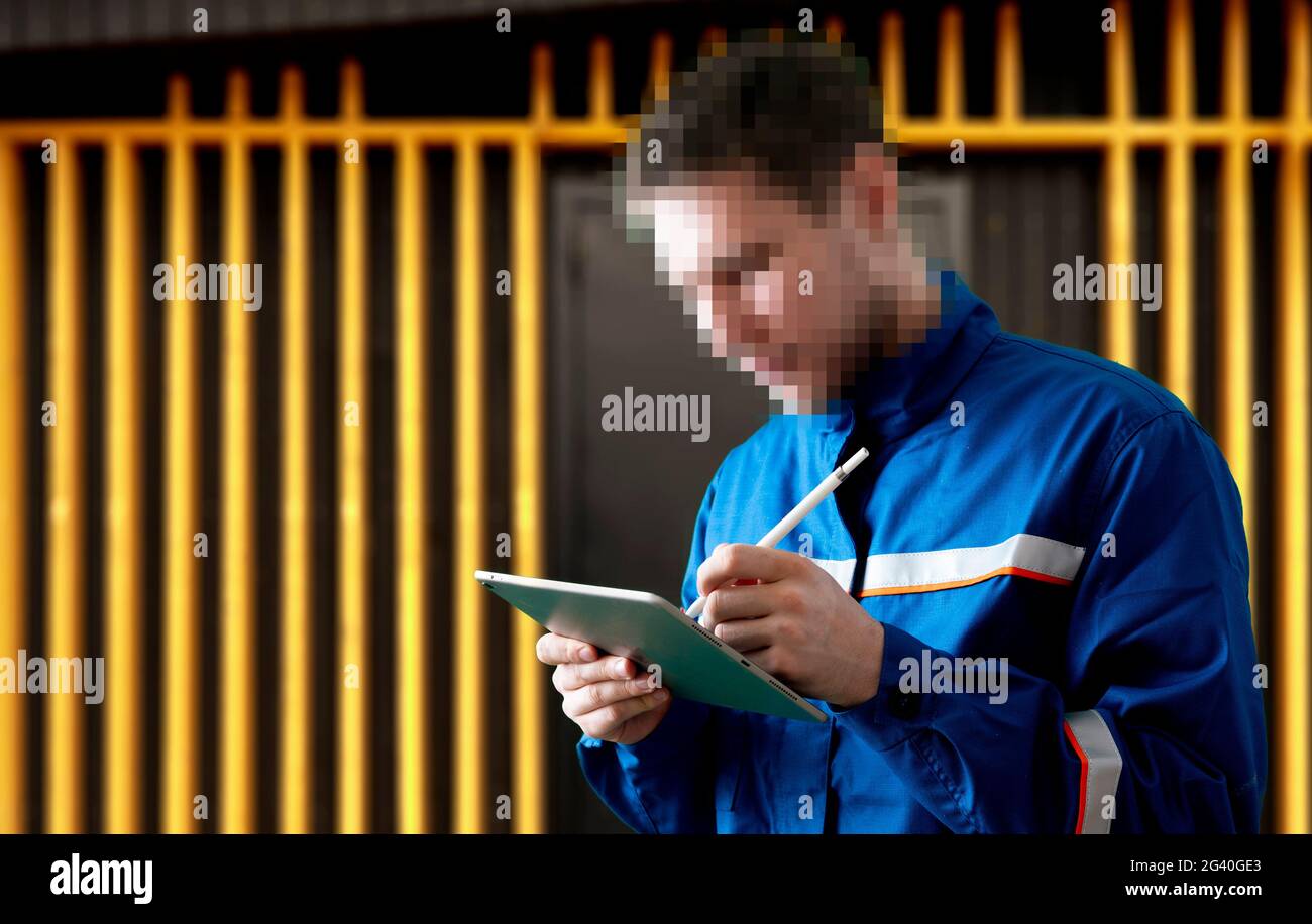 portrait of person with censored pixels tab on the face, personal ...