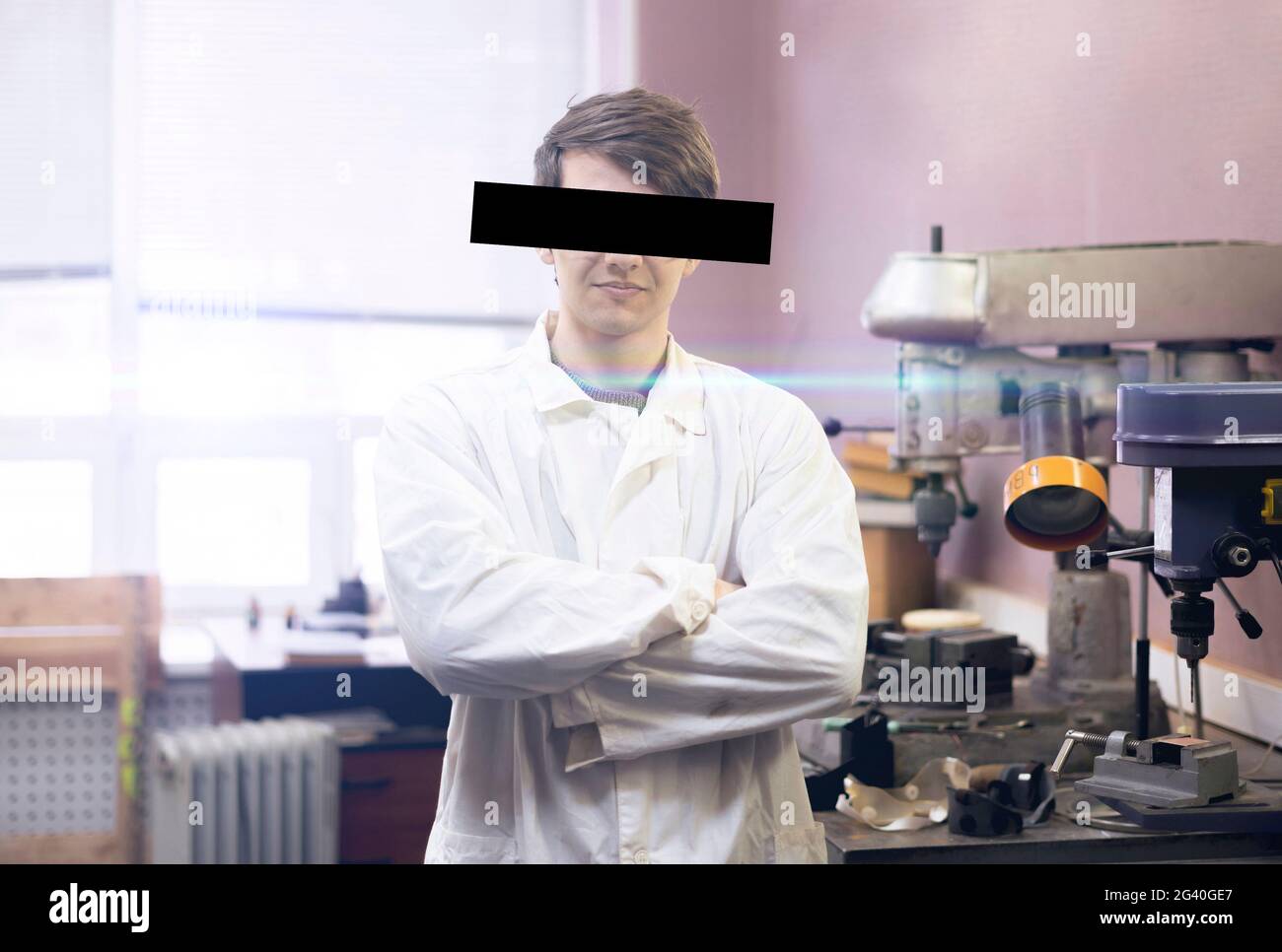 portrait of person with censored pixels tab on the face, personal ...