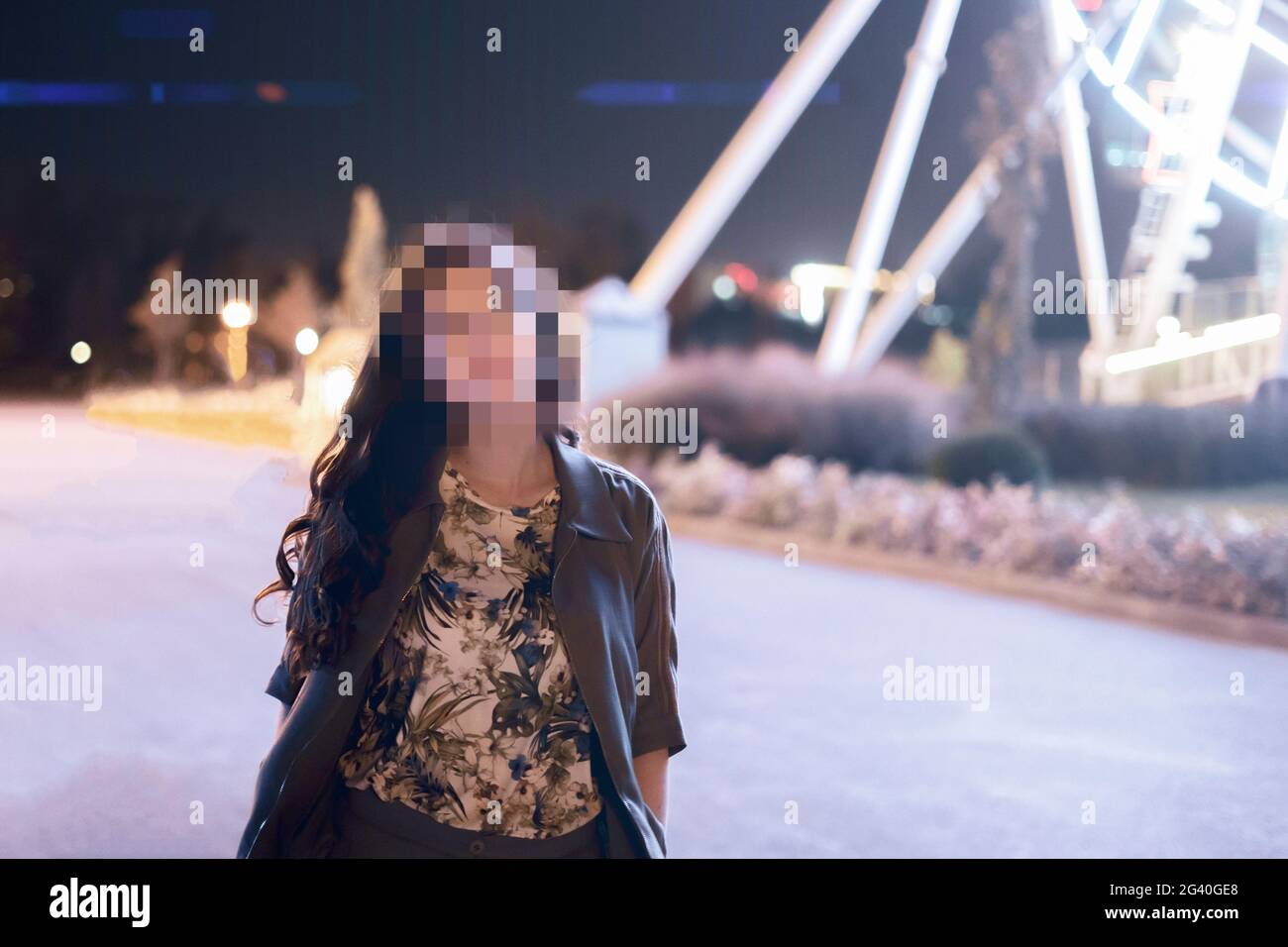 portrait of person with censored pixels tab on the face, personal ...