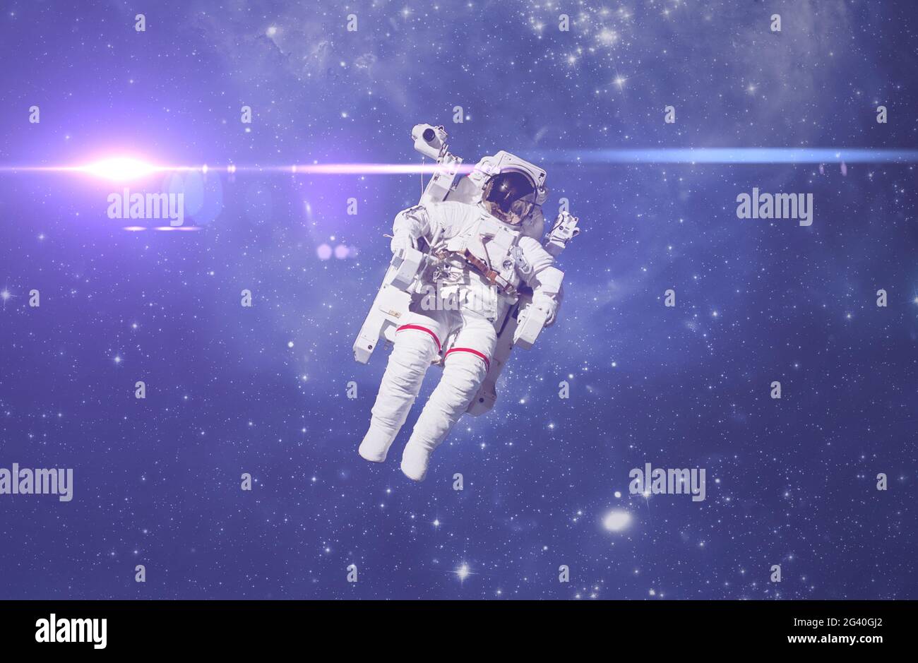 cosmonaut fly in the outer space with stars and galaxy background with ...