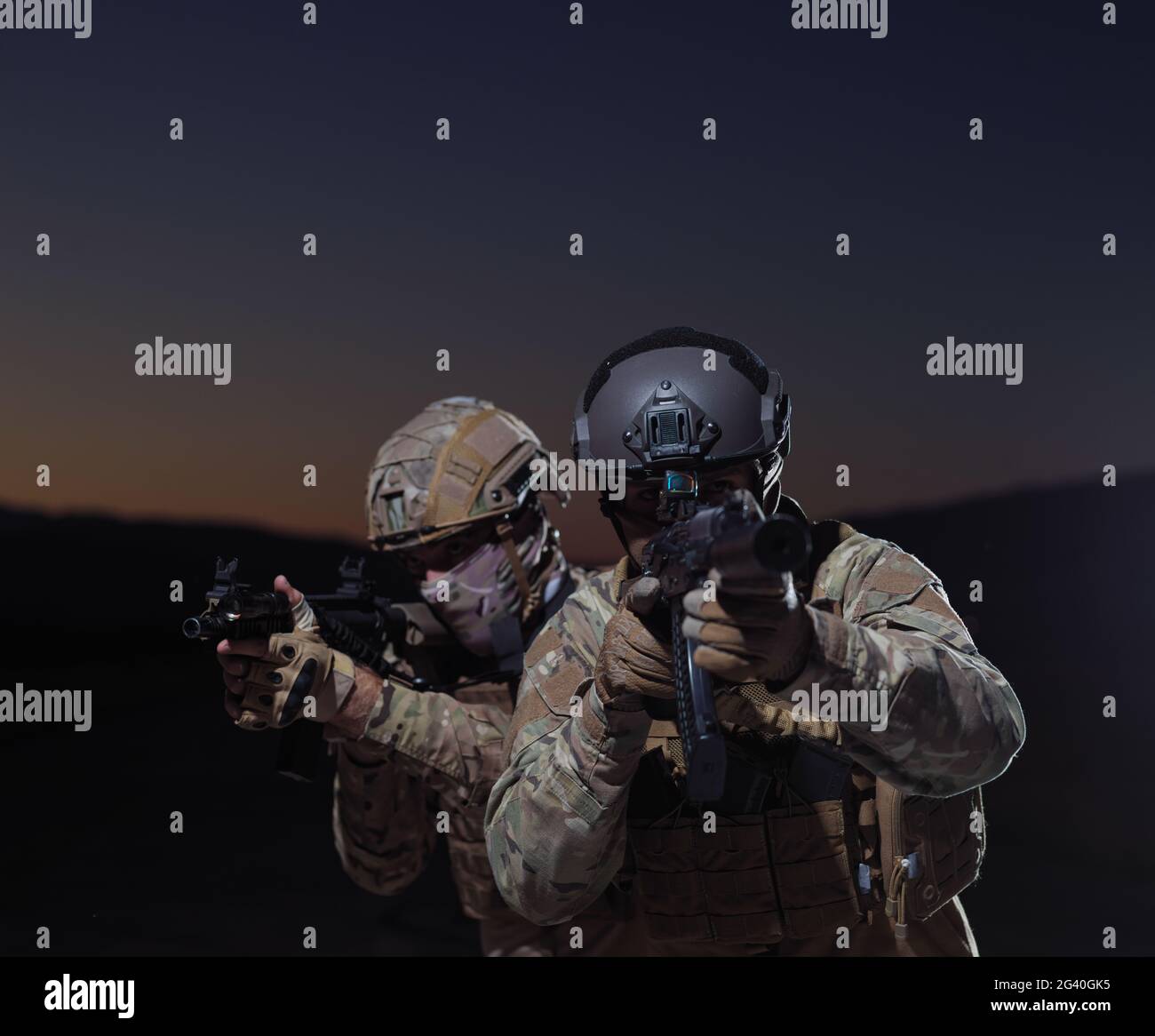 Soldiers squad in night mission Stock Photo - Alamy