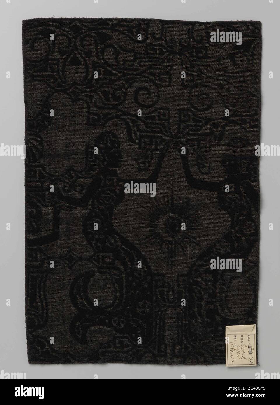 Fragment shaved velvet with design "Zee symphen", dark blue on gold ...