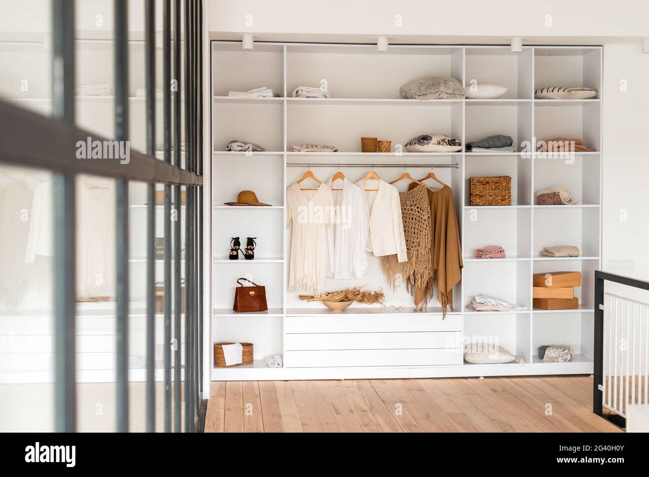 Modern interior, beautiful wardrobe with clothes Stock Photo - Alamy