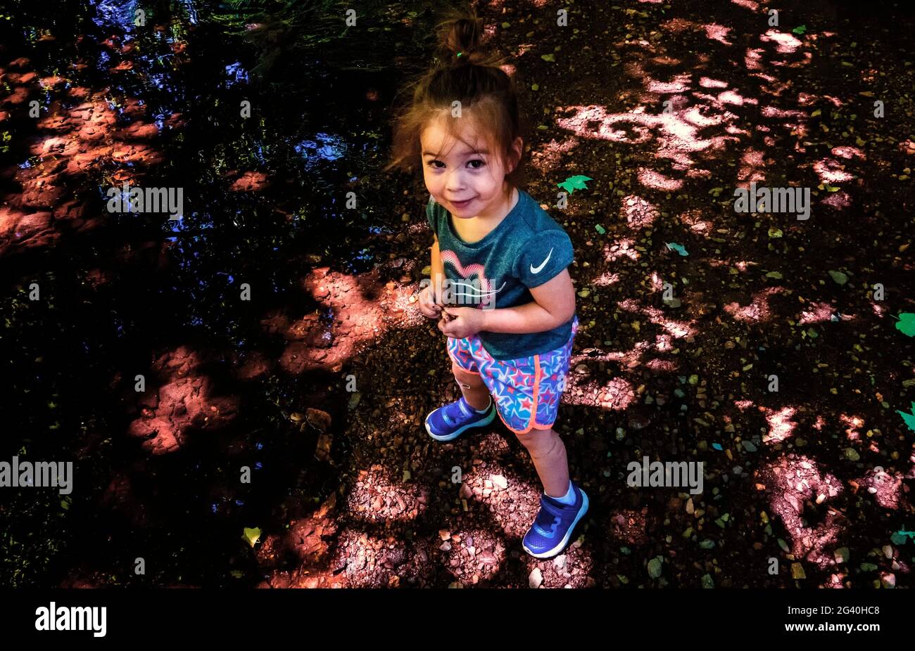 Child looks to camera hi-res stock photography and images - Alamy