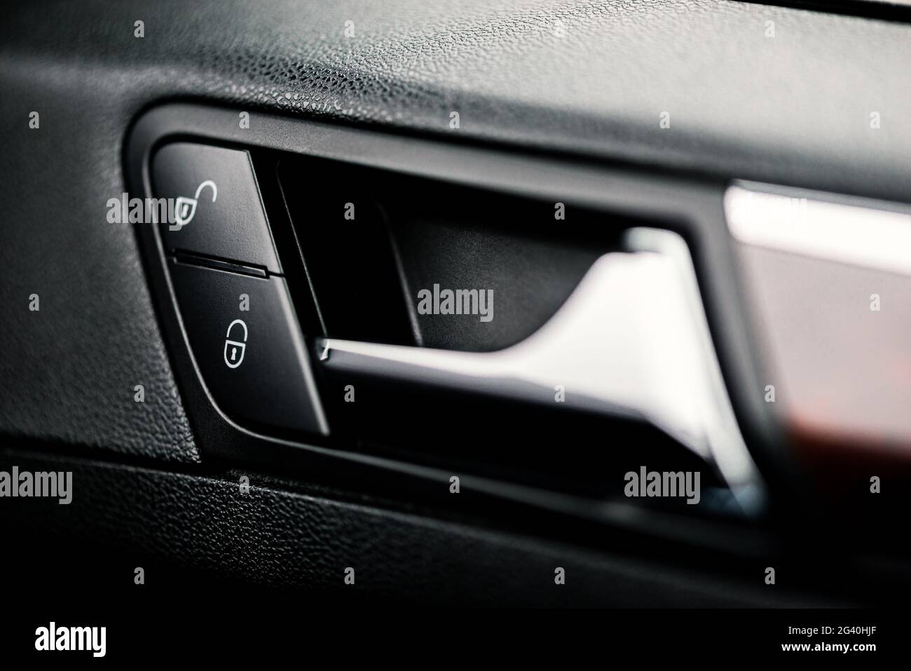 Closeup door lock in the car indoors. Macro image Stock Photo - Alamy