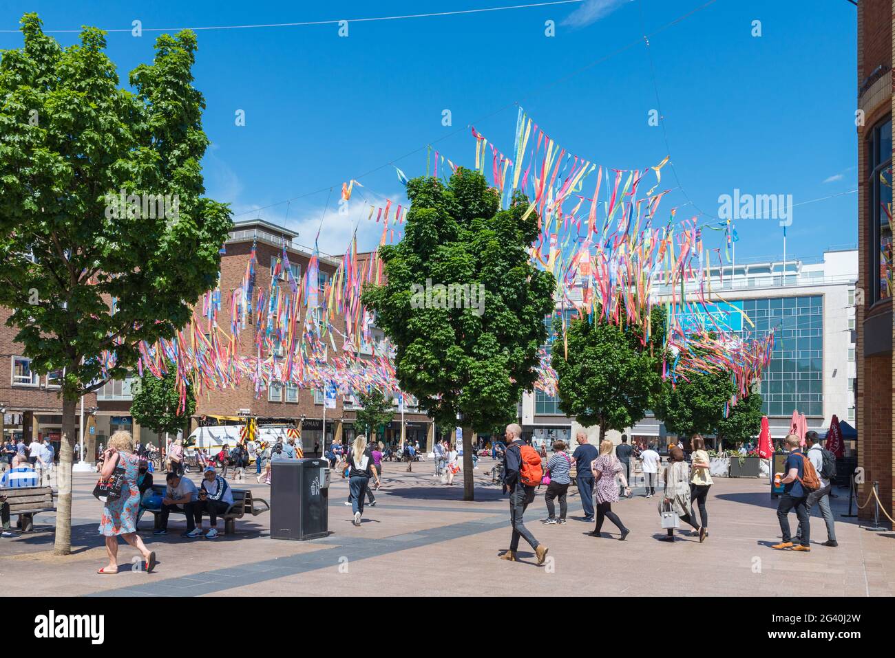 Colourful flags and banners in Broadgate, Coventry celebrating Coventry ...