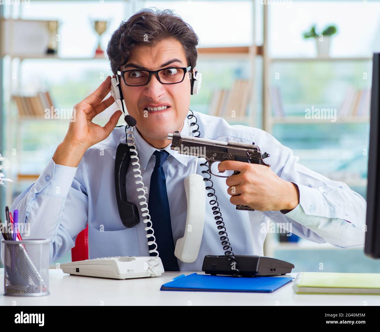 Unhappy angry call center worker frustrated with workload Stock Photo ...