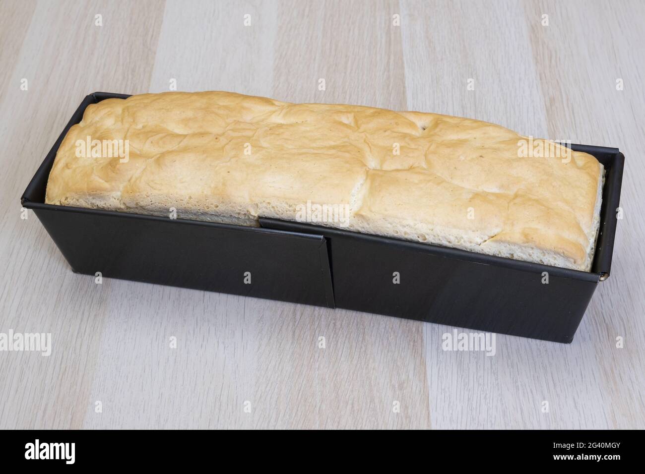 White bread in a cake pan Stock Photo - Alamy