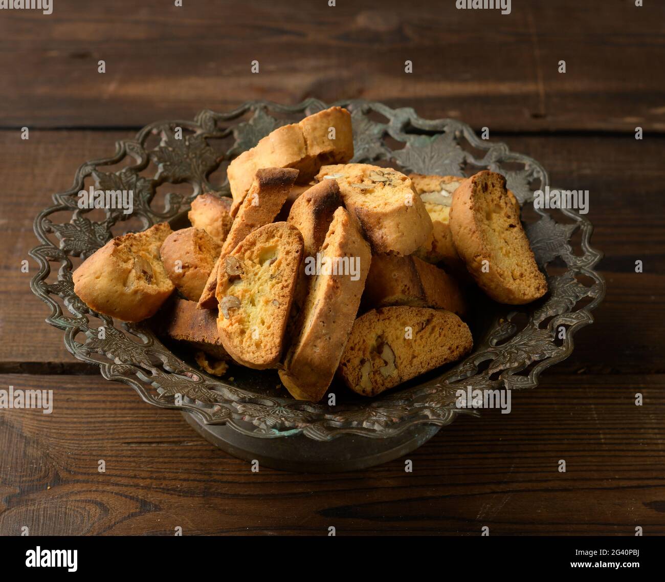 Pieces of baked italian christmas biscotti cookies in a metal plate ...