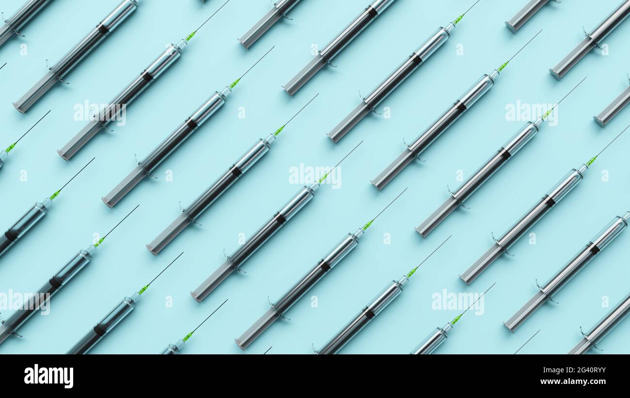 Many syringe at a table Stock Photo - Alamy
