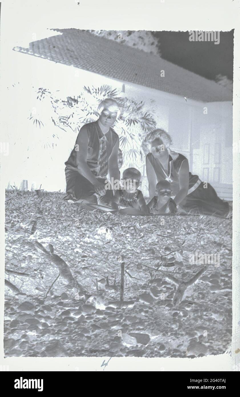 H. de Roo, Suus and three children on a lawn. Part of Kodak Negatives ...