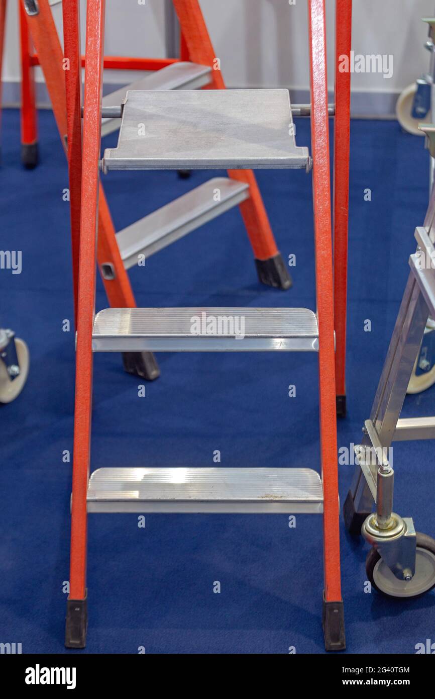 Metal Step Ladder in Storage Room Warehouse Stock Photo - Alamy