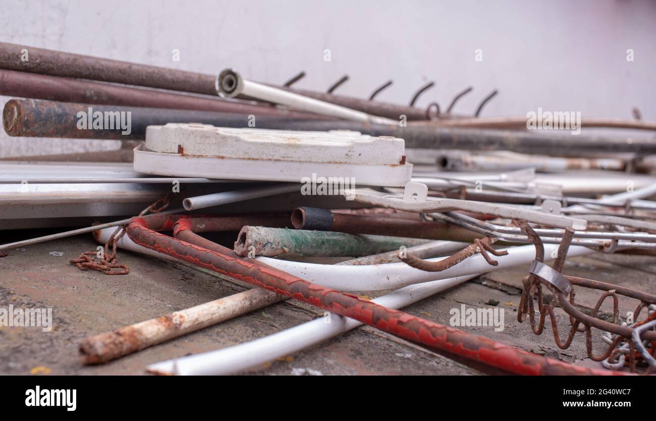 Scrap iron small stacked on a pile and prepared for metal recycling ...
